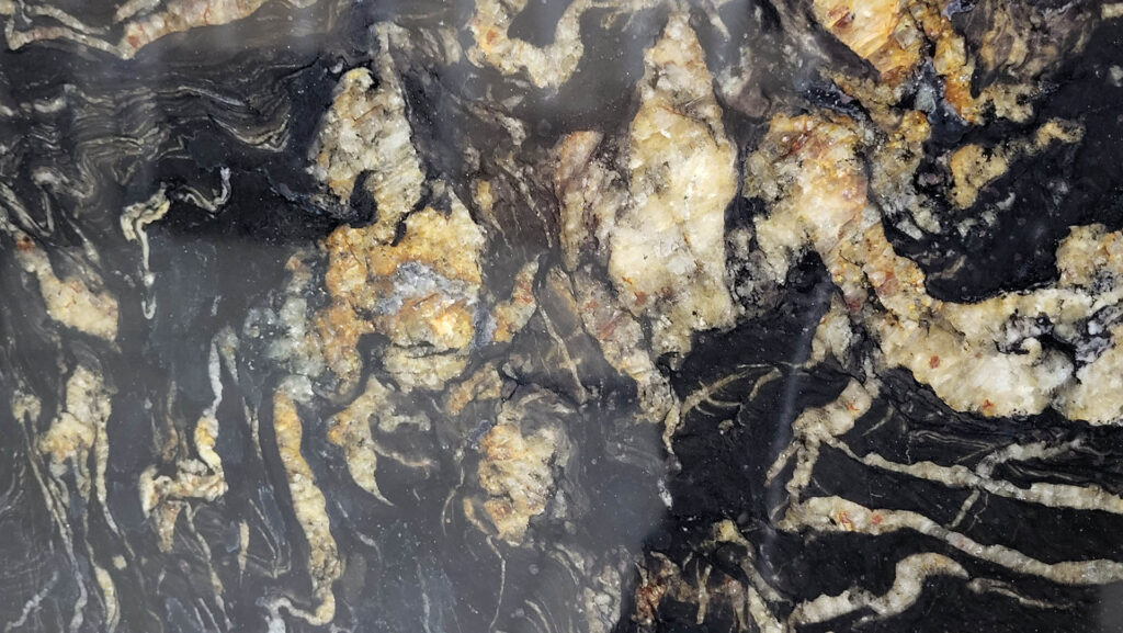 TITANIUM GOLD – AEJ Granite Inc